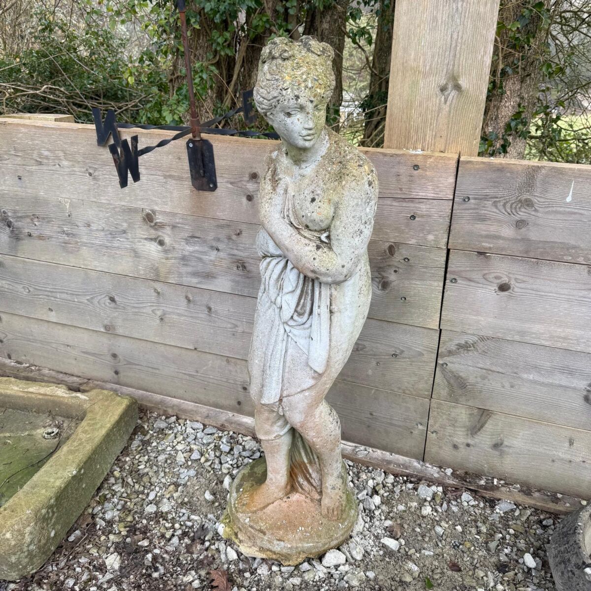 Weathered Stone Garden Statue