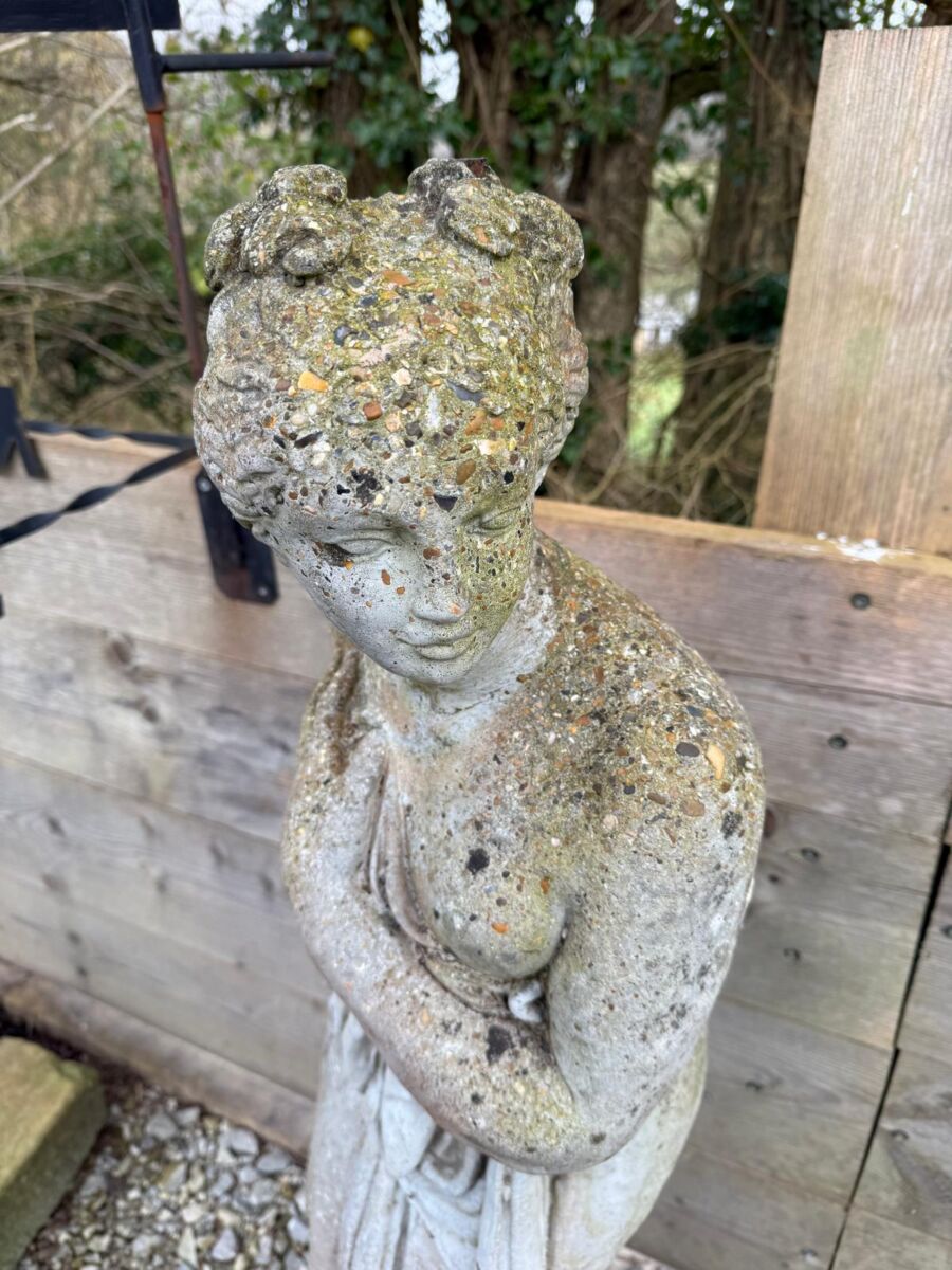 Weathered Stone Garden Statue