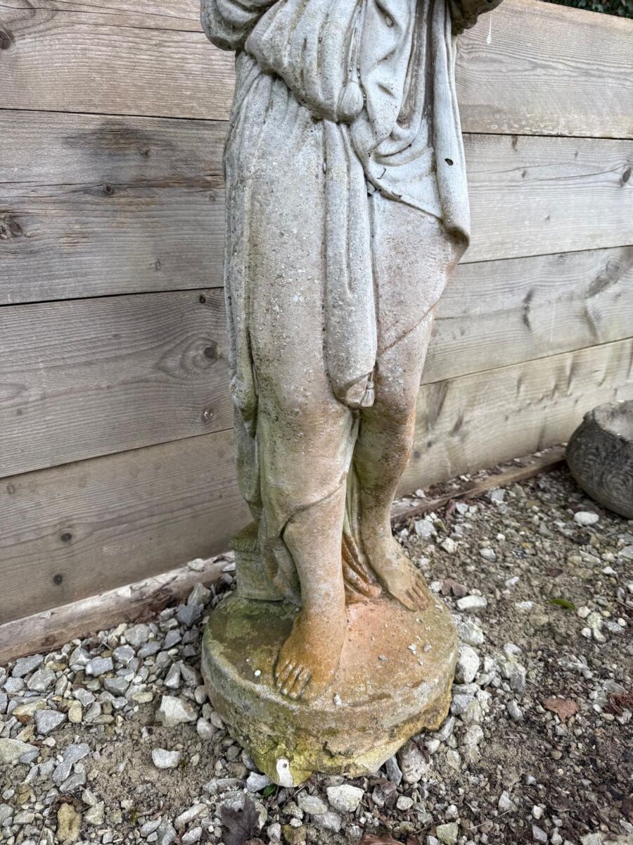 Weathered Stone Garden Statue