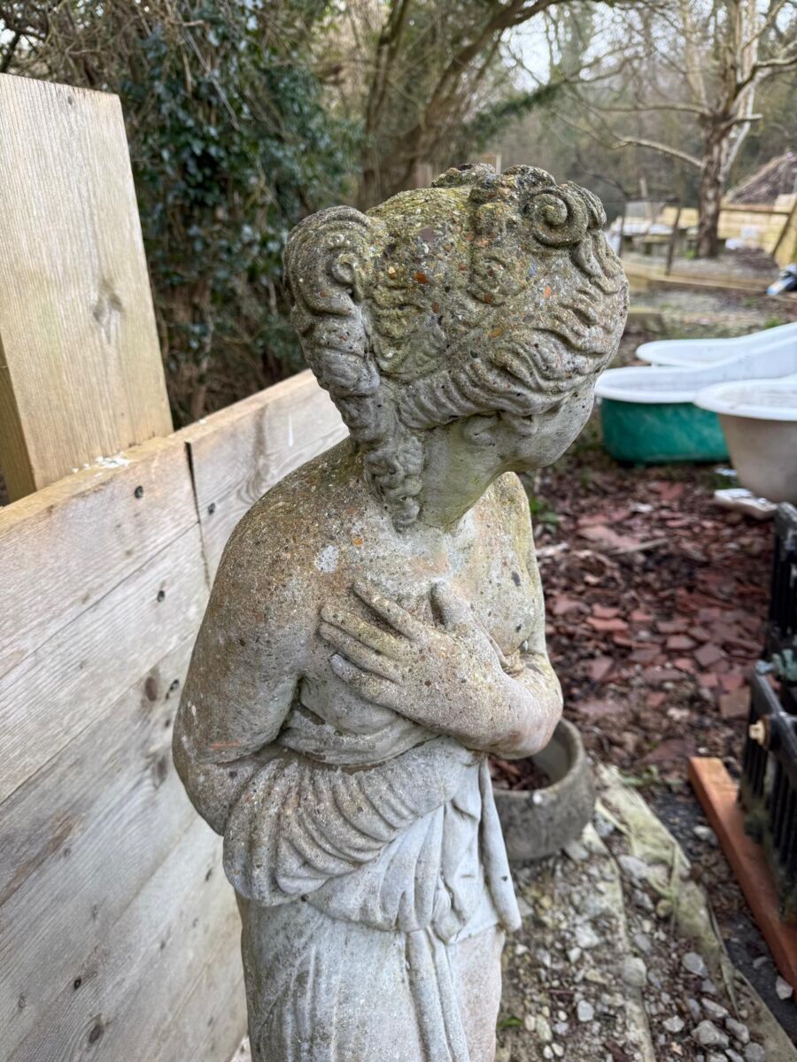 Weathered Stone Garden Statue